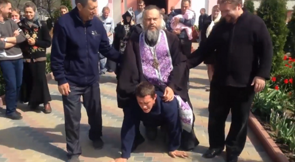 Moldovan Orthodox Church Priest Rides Man Like Donkey to Exorcise Demon ...