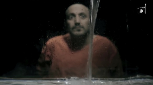 ISIS Drowns Iraqi Spy Using Fish Tank in First 2017 Execution Video | World